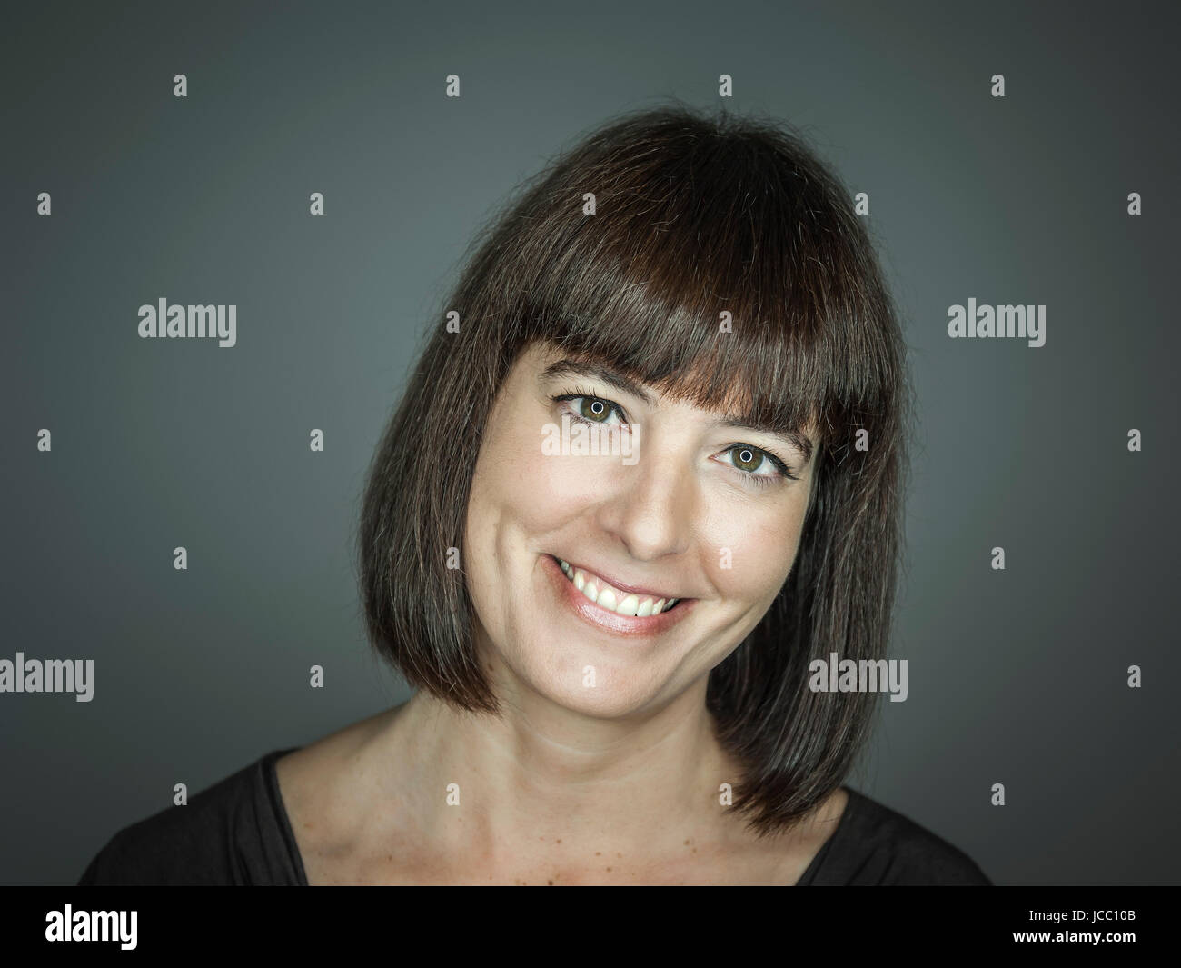An image of a beautiful smiling woman Stock Photo - Alamy