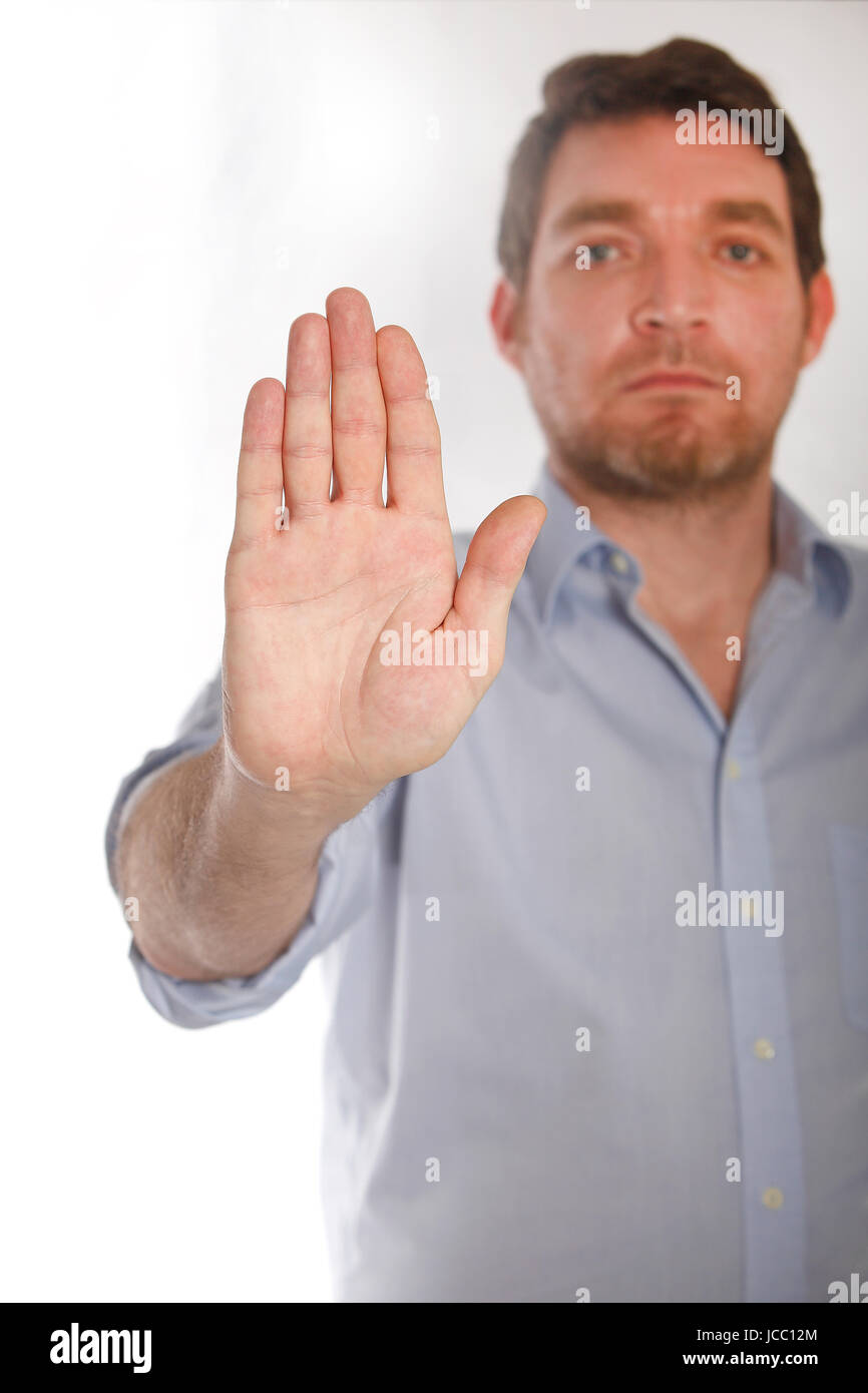 Stop sign of a man in blue shirt in front of a white background Stock ...