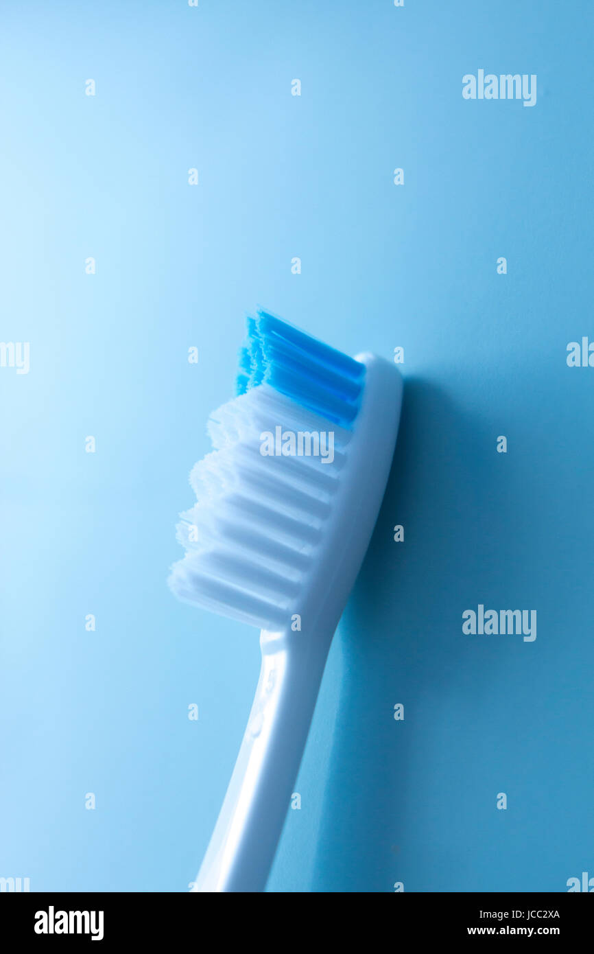 Dental toothbrush to clean teeth isolated in bathroom closeup Stock ...