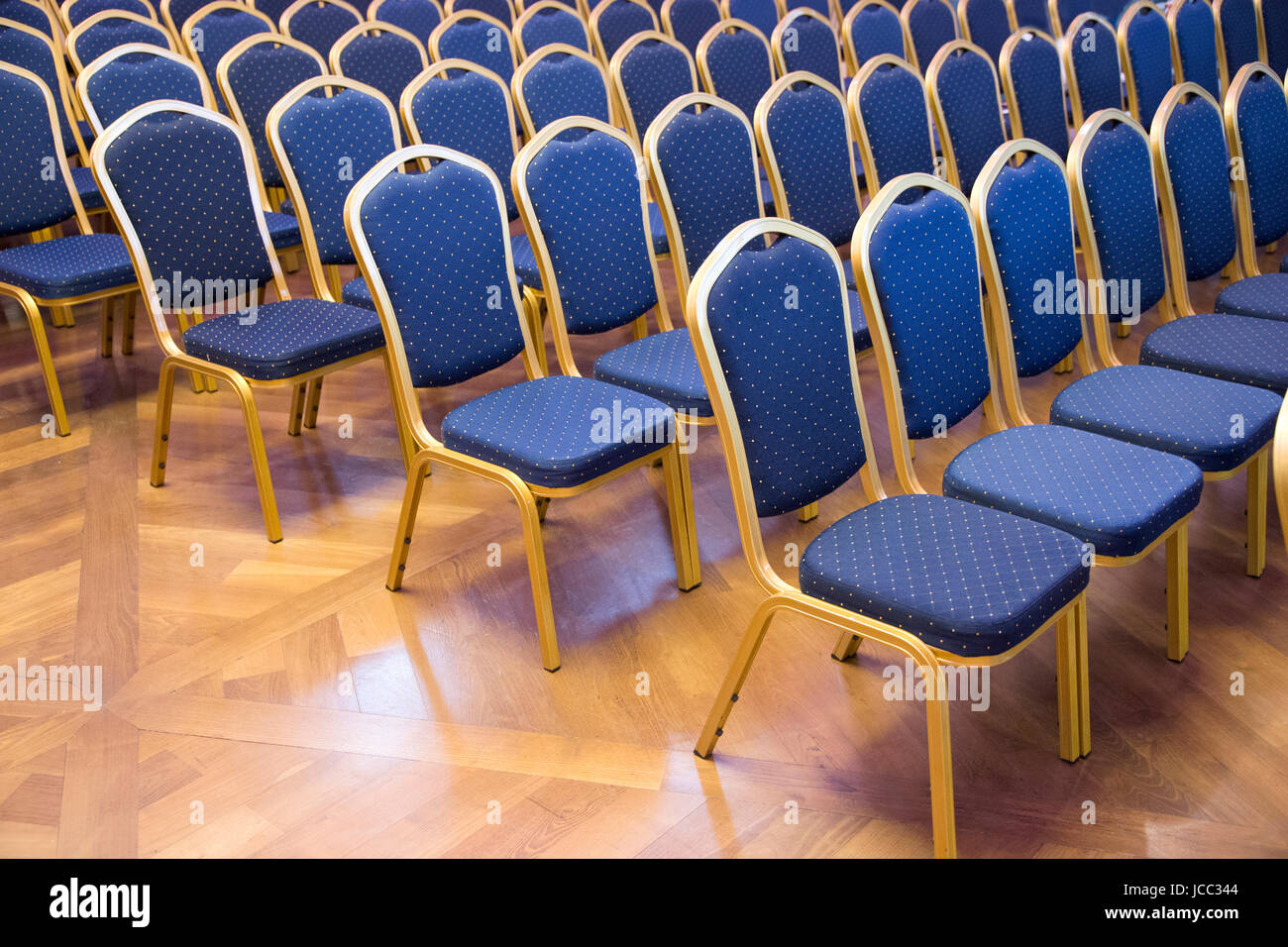 Empty blue colored auditorium seats in unknown business hall Stock ...
