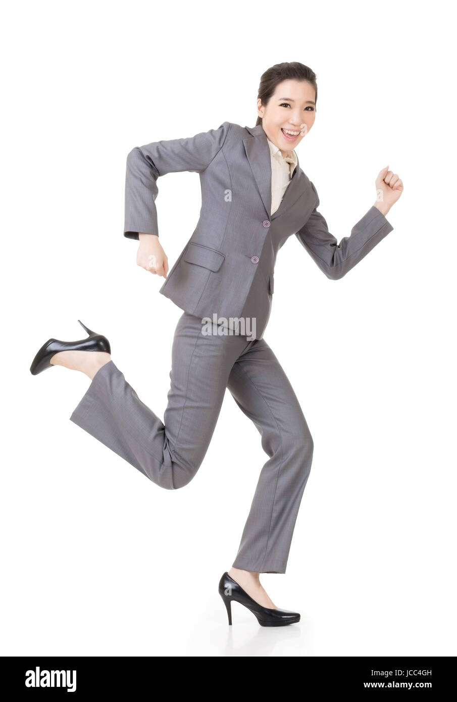 Happy running Asian businesswoman, full length portrait isolated on ...