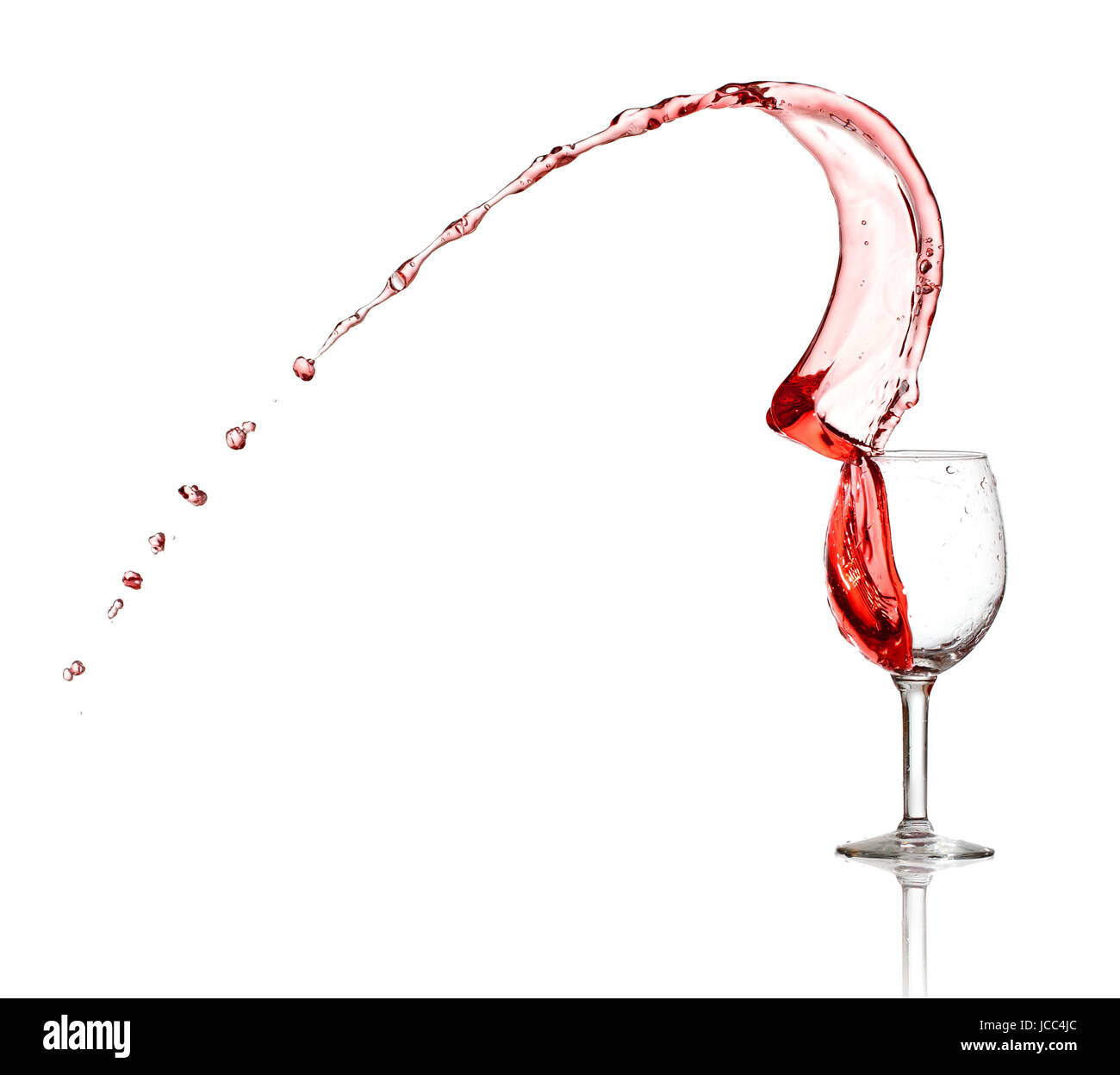 Red wine splash from a glass isolated on white background Stock Photo ...