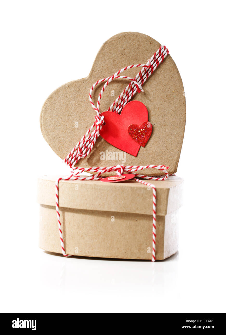 Heart shaped gift boxes with heart tags isolated on white background ...