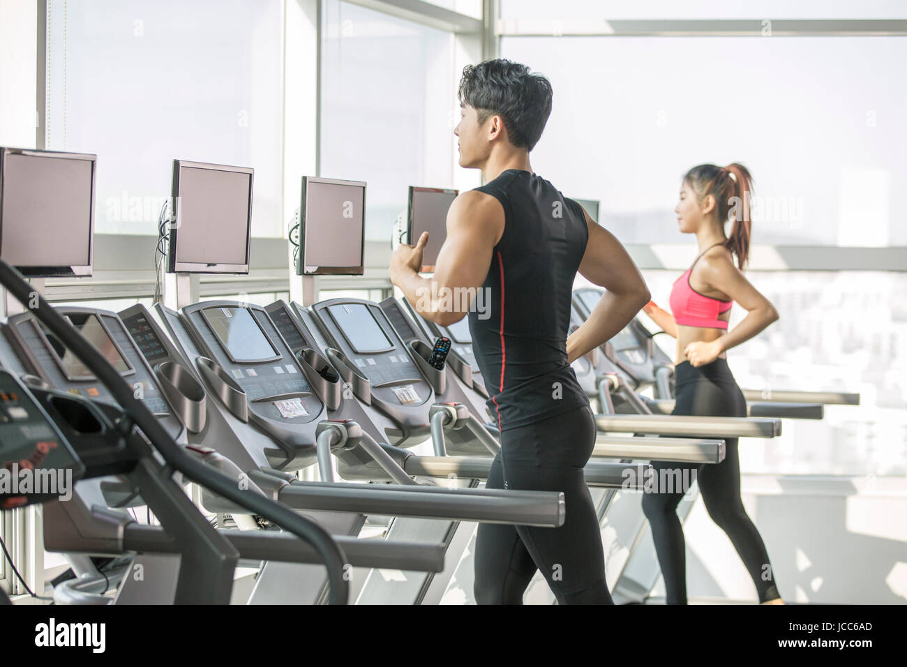 People exercising at health club Stock Photo - Alamy