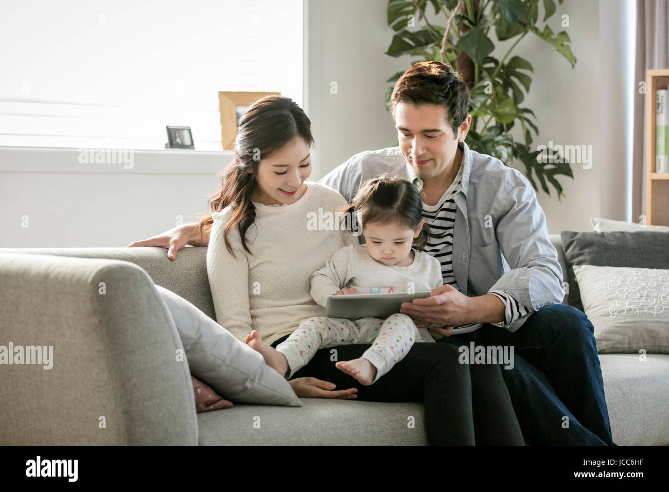 Harmonious multicultural family Stock Photo - Alamy