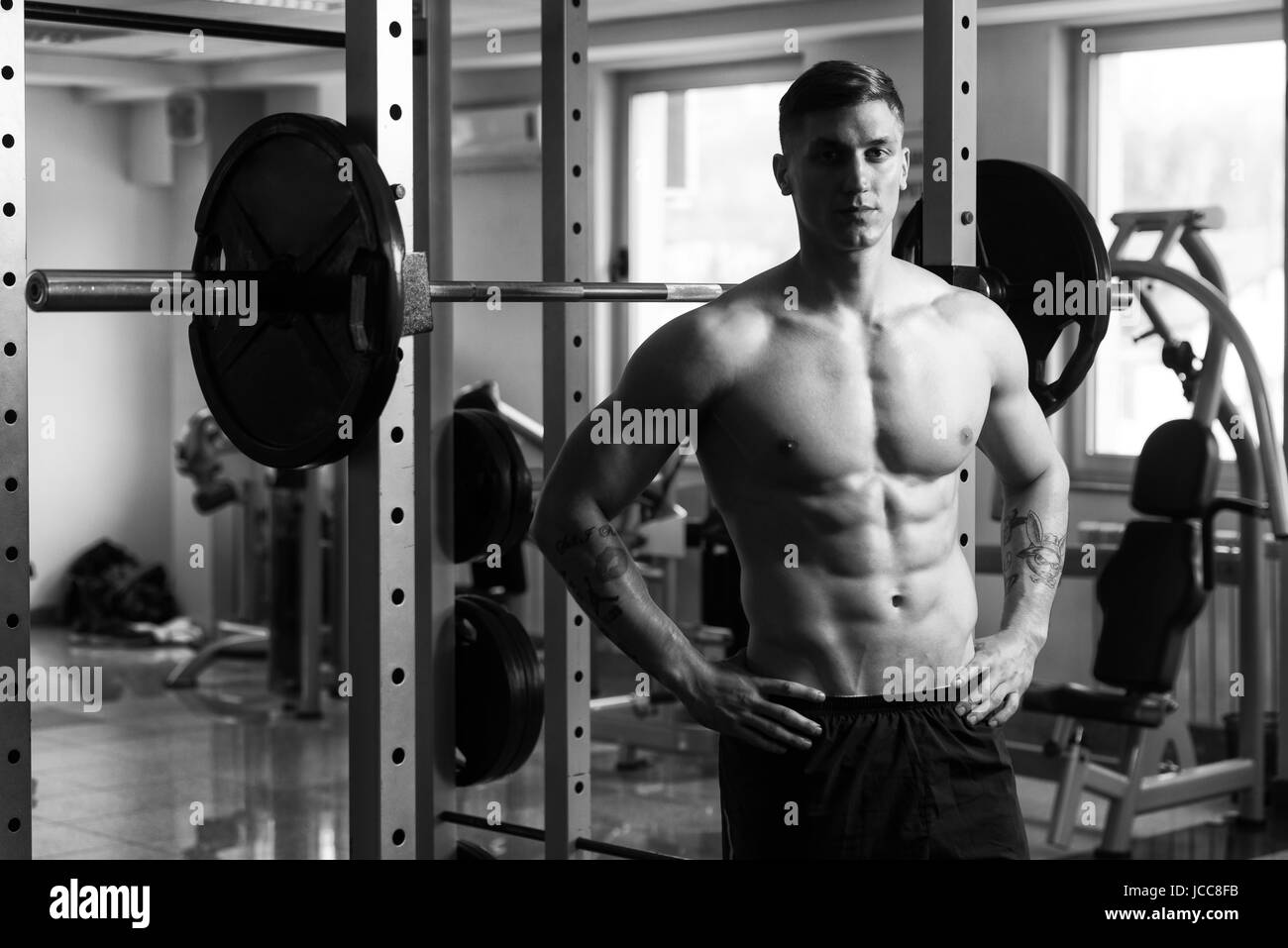 Good Looking And Attractive Young Man With Muscular Body Standing In ...