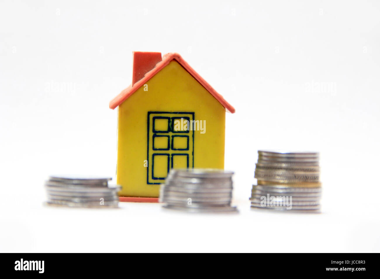 Conceptual image indicating money required for realizing dream house ...