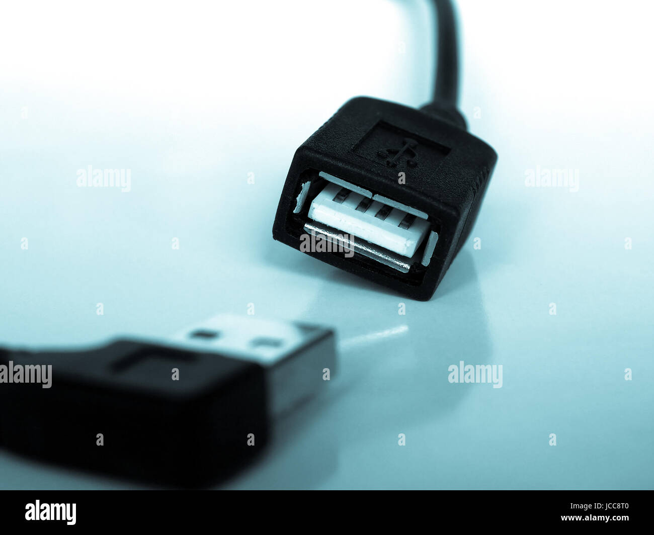 Detail of an USB plug and socket - cool cyanotype Stock Photo - Alamy