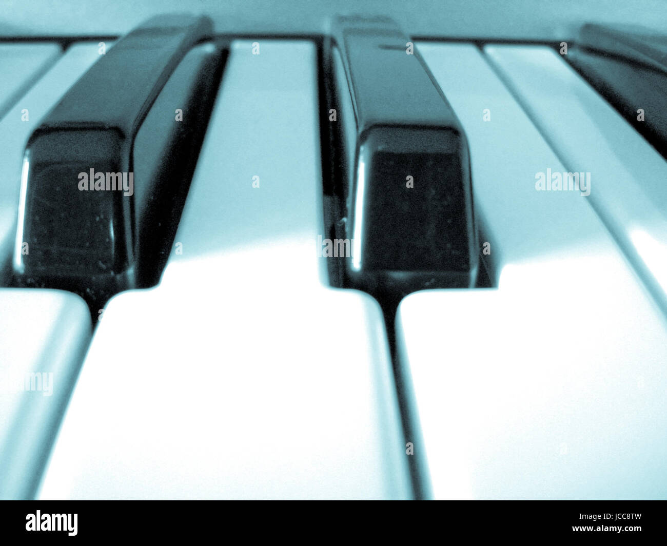 Music keyboard picture - cool cyanotype Stock Photo - Alamy
