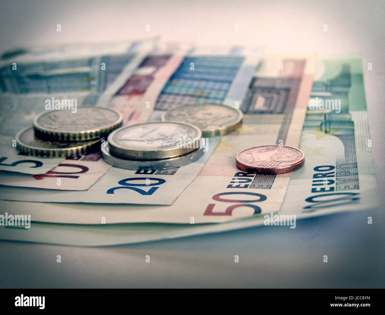 Vintage looking Euro banknotes and coins picture Stock Photo - Alamy