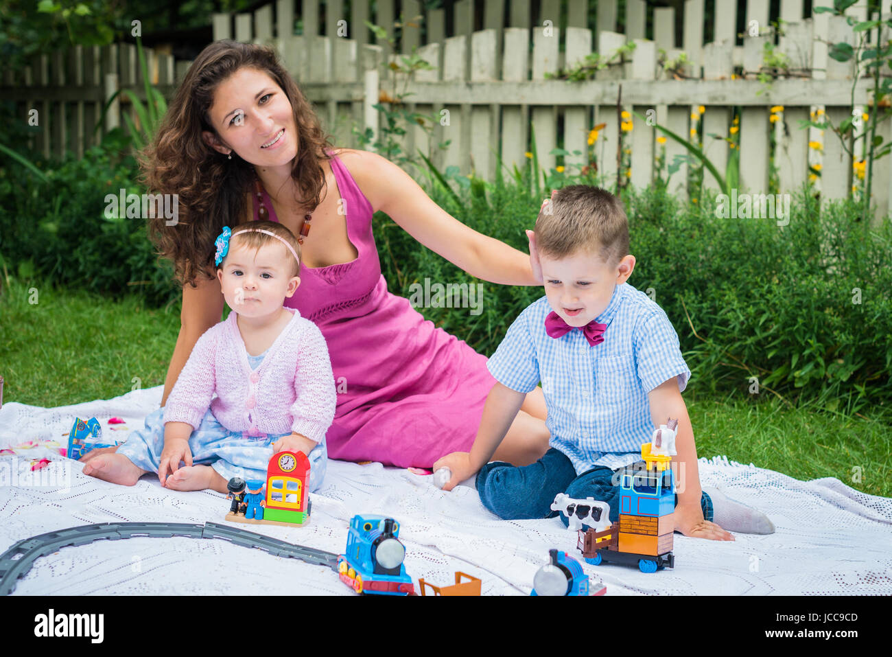Happy mother and two children Stock Photo - Alamy