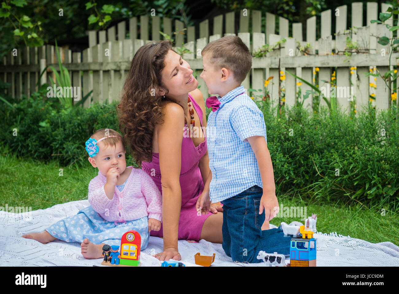 Happy mother and two children Stock Photo - Alamy