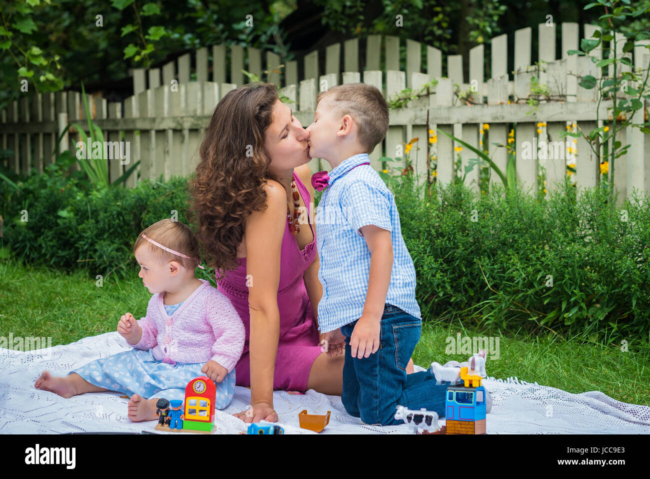 Happy mother and two children Stock Photo - Alamy