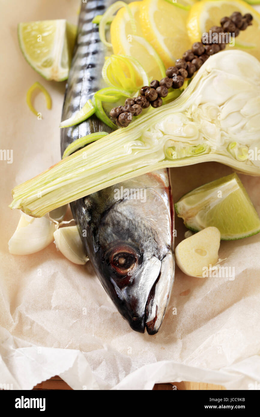 Fresh mackerel and other ingredients on paper Stock Photo - Alamy