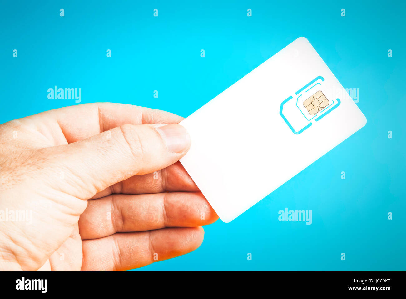 A man holding a blank smart card Stock Photo - Alamy