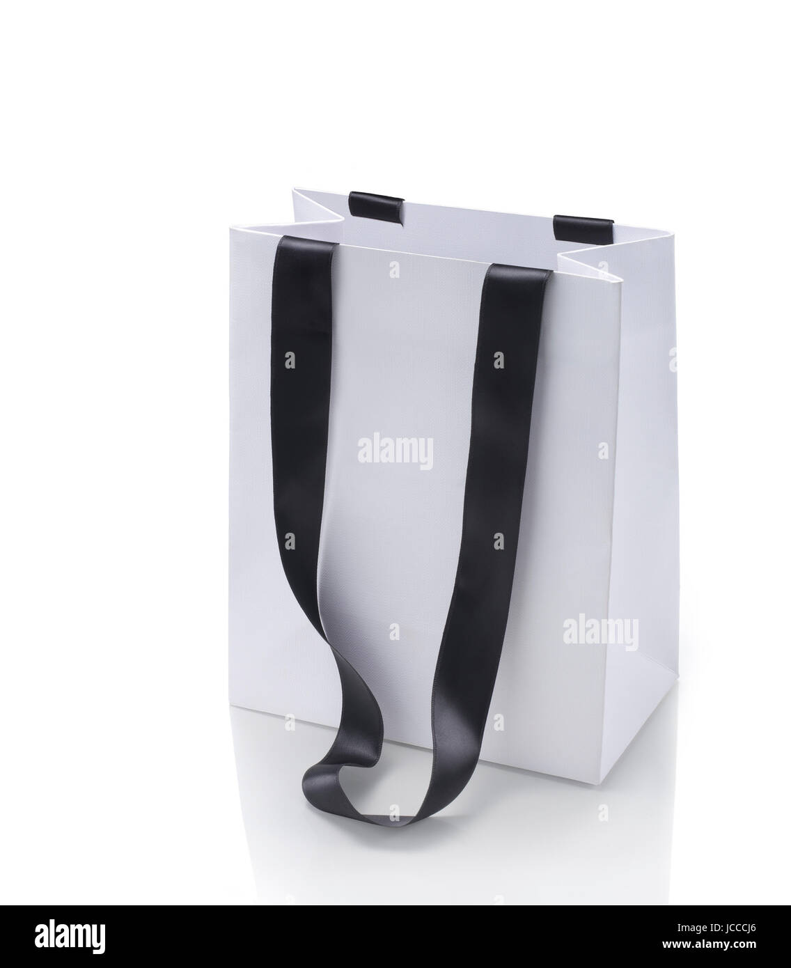 White shopping bag on white background and soft reflection. clipping ...