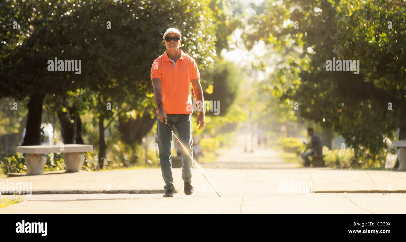 Visually impaired person walking hi-res stock photography and images ...