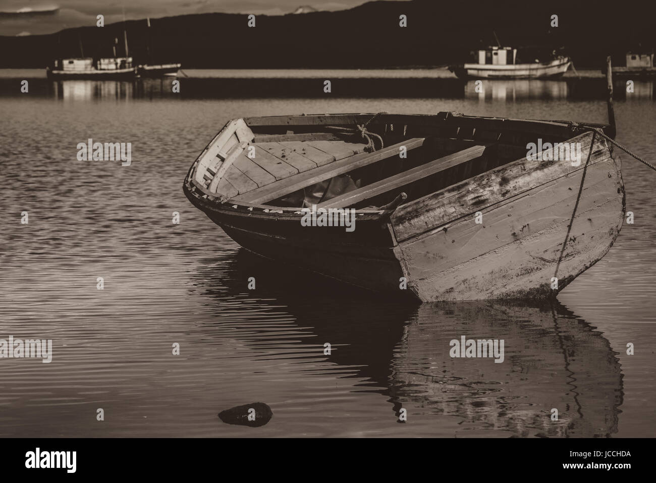 Old rowing boat in Puerto Natales Stock Photo - Alamy