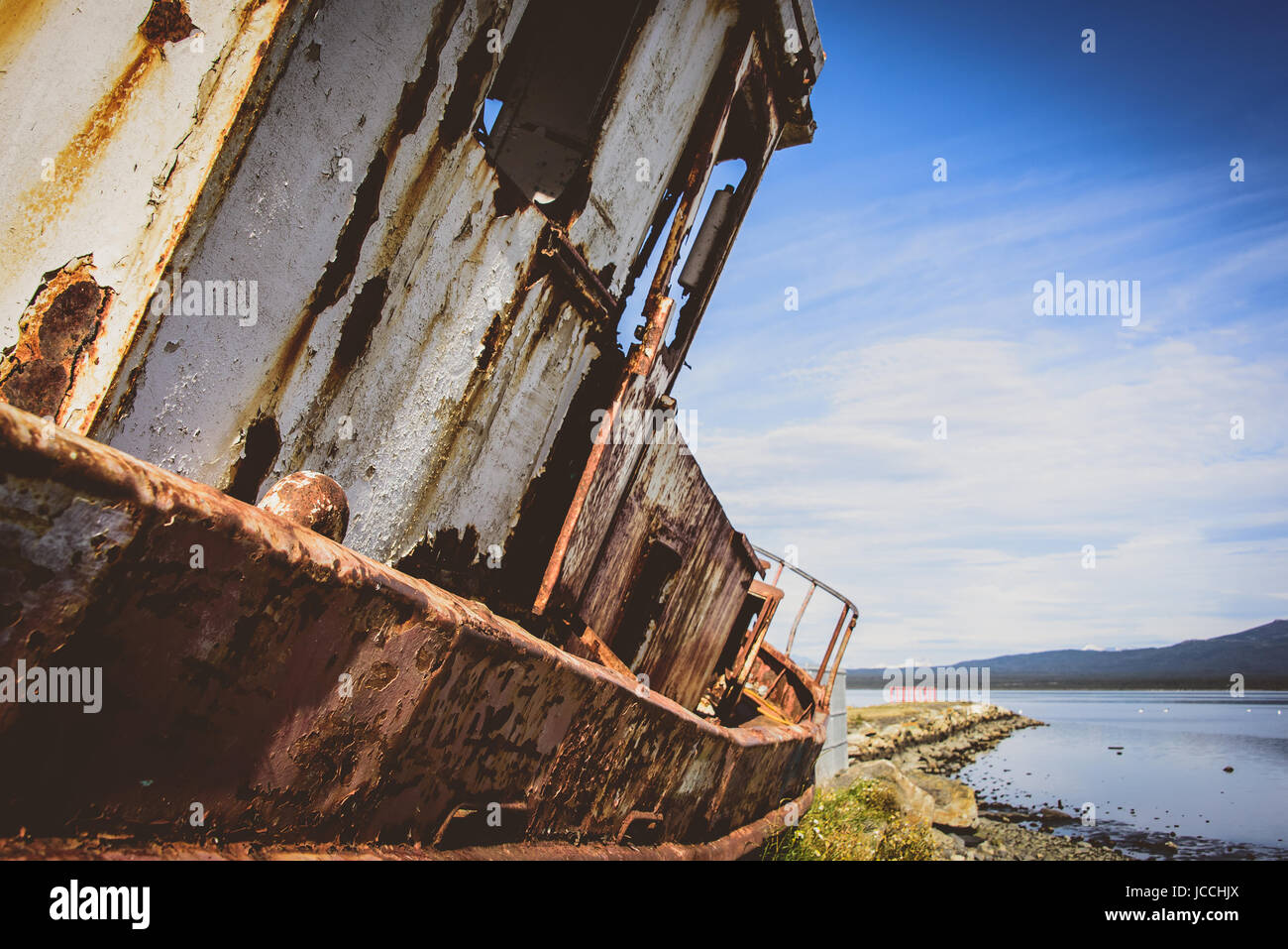 Rusty ship wreck in Puerto Natales Stock Photo - Alamy