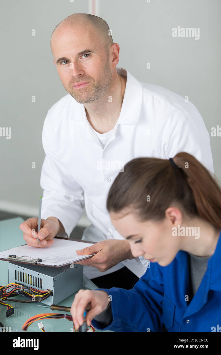 student and teacher in electrical engineering course Stock Photo - Alamy