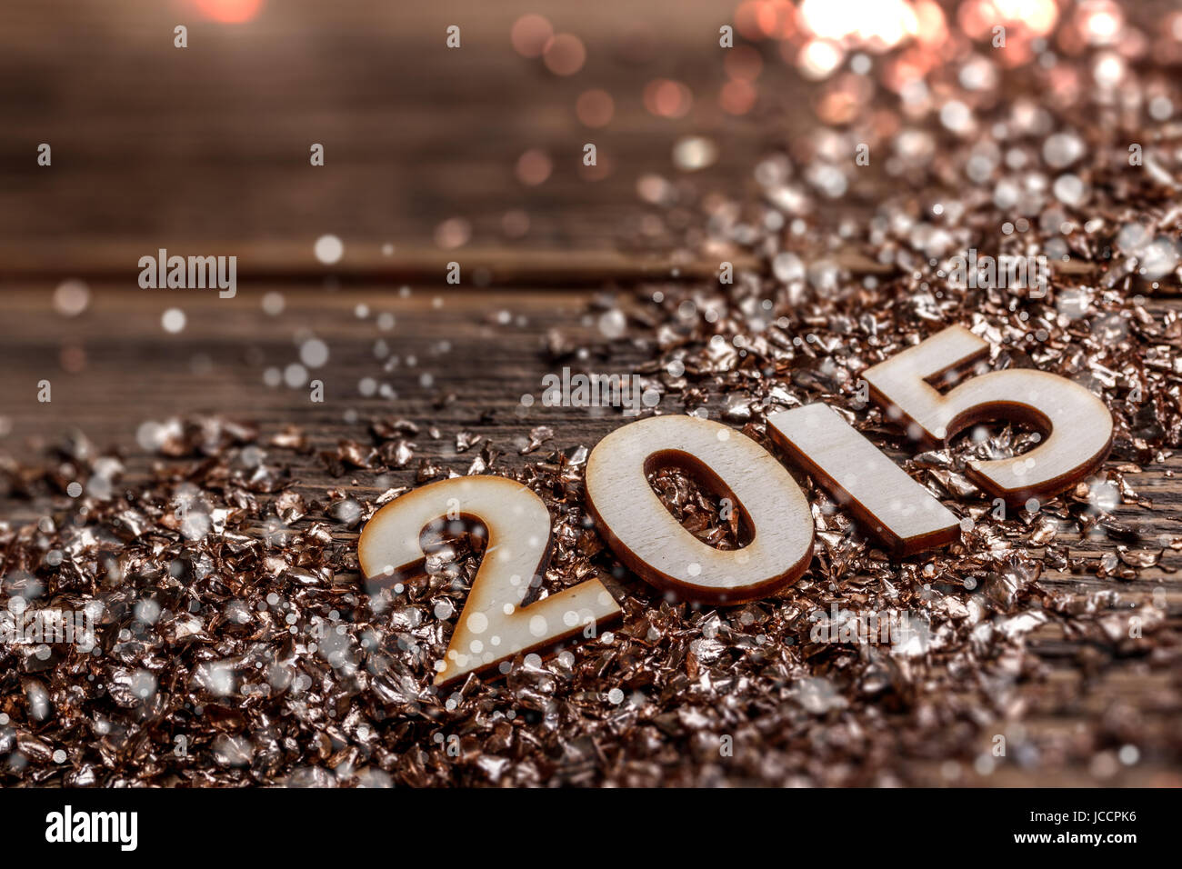 Wooden numbers forming 2015 on a rustic wooden suface Stock Photo - Alamy