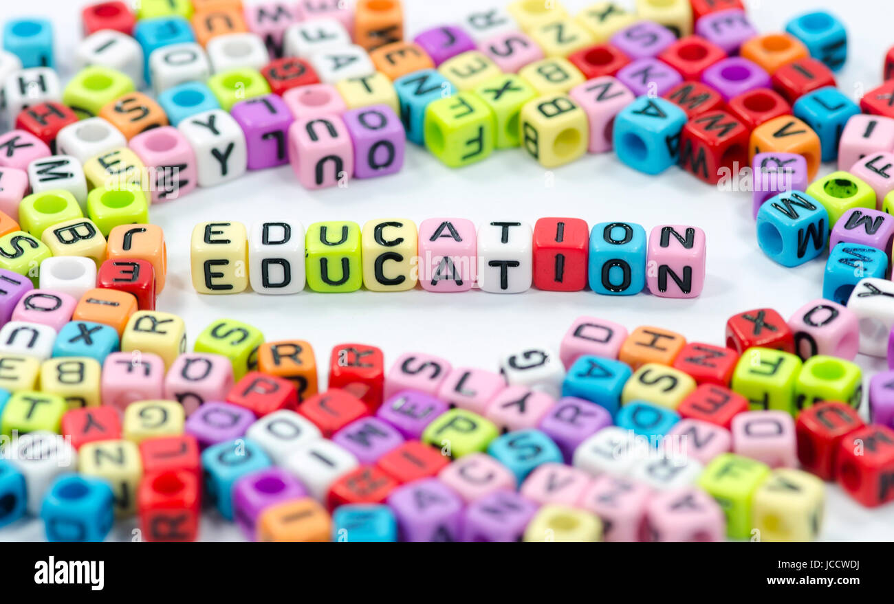 word education spell using colorful alphabets beads Stock Photo - Alamy