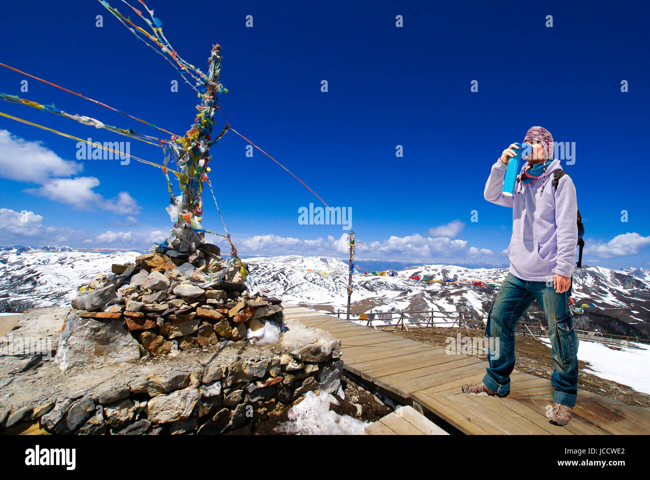 Climber breathing with mini portable oxygen cylinder to avoid and treat ...