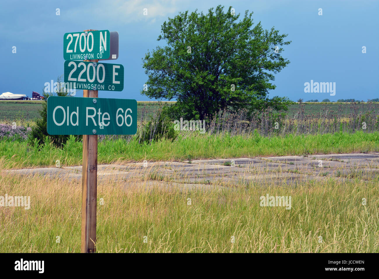 A section of the original Rte 66 roadway is overgrown and abandoned ...