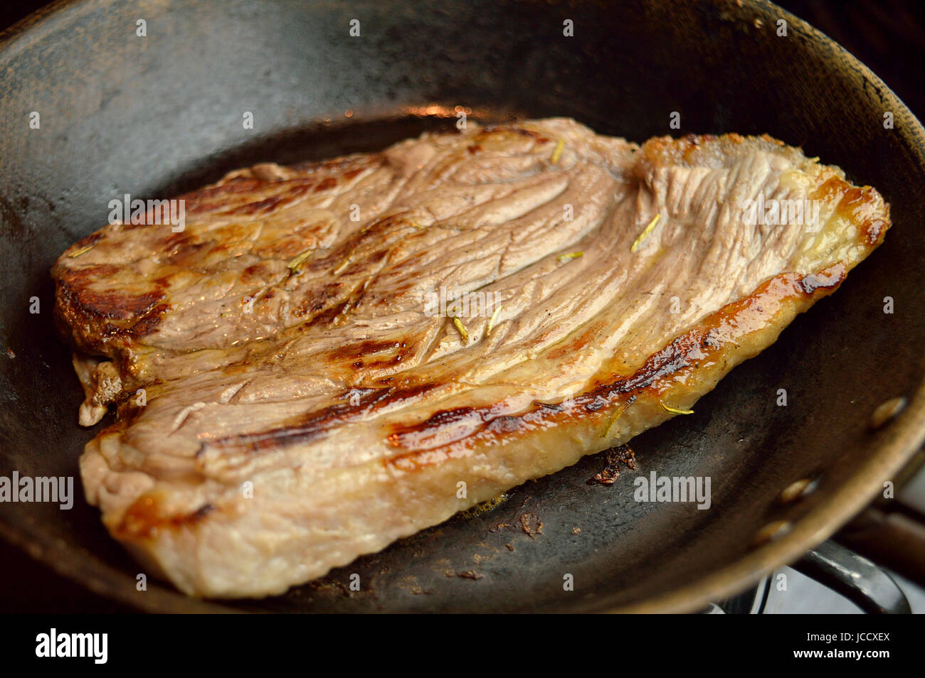 Cooked Red meat beef on a pan ready to be served Stock Photo - Alamy