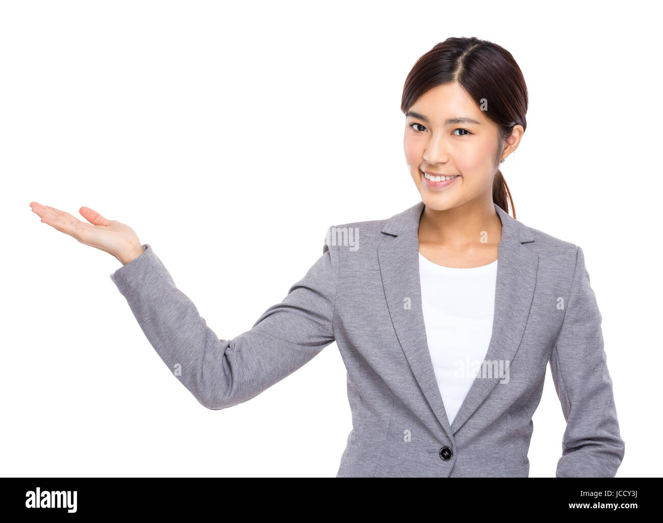 Asian businesswoman with hand presentation Stock Photo - Alamy