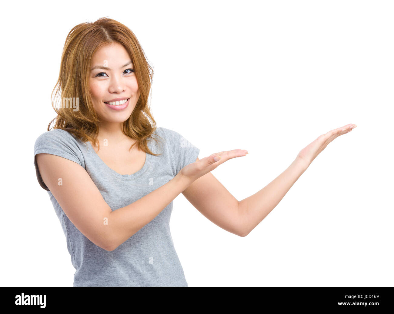 Woman bothing hand showing something Stock Photo - Alamy