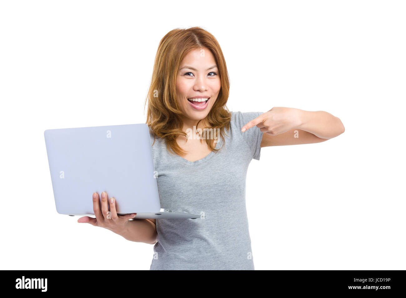 Woman finger point to laptop computer Stock Photo - Alamy