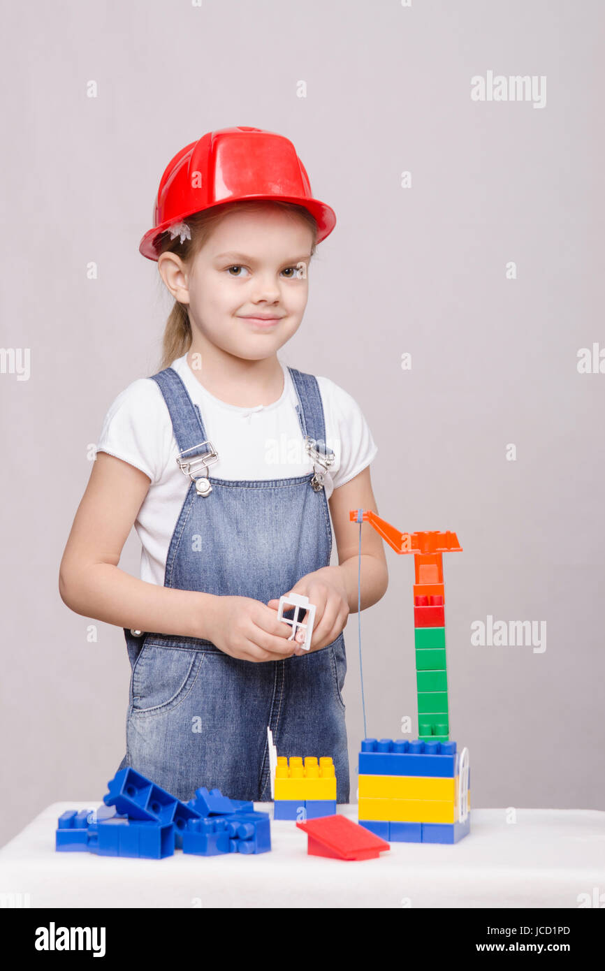 Girl playing in the Builder builds from the designer house Stock Photo ...