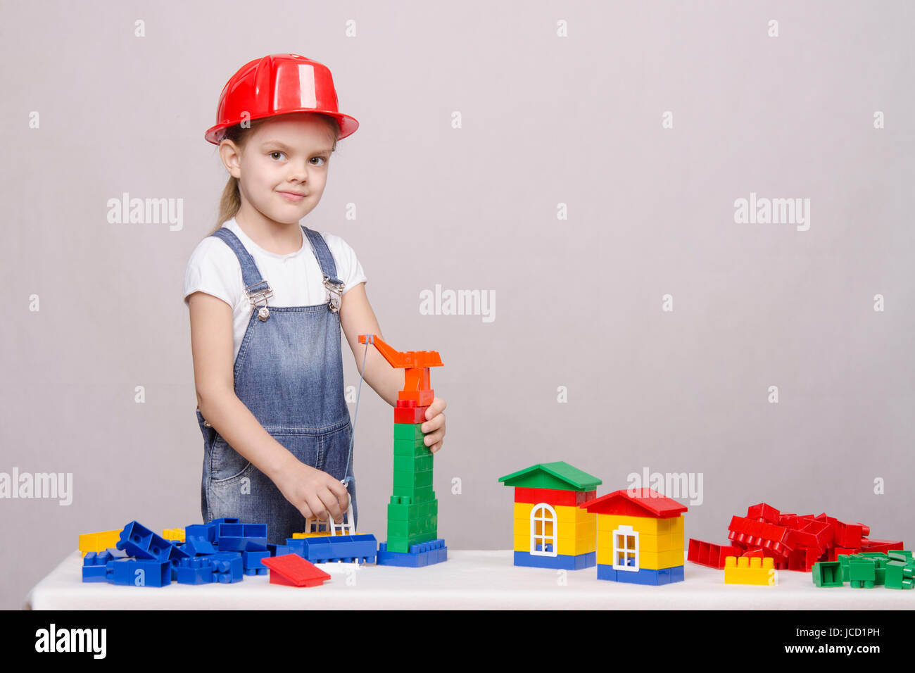 Girl playing in the Builder builds from the designer house Stock Photo ...