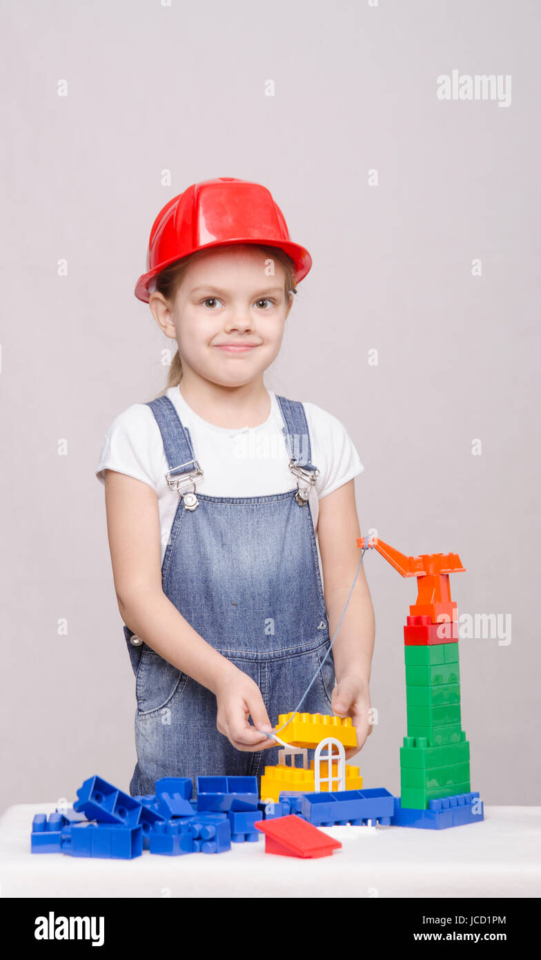 Girl playing in the Builder builds from the designer house Stock Photo ...