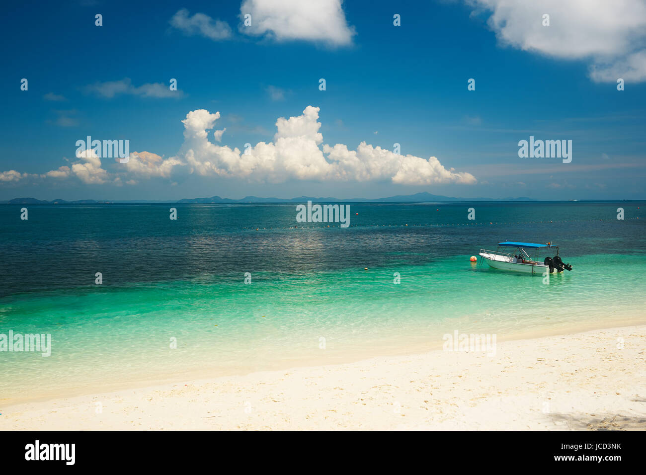 Beautiful tropical beach in Rawa island. White sandy beach seen from ...
