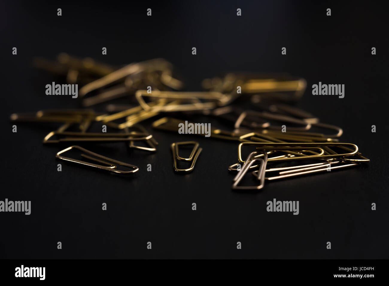Paperclip on the office desk Stock Photo - Alamy