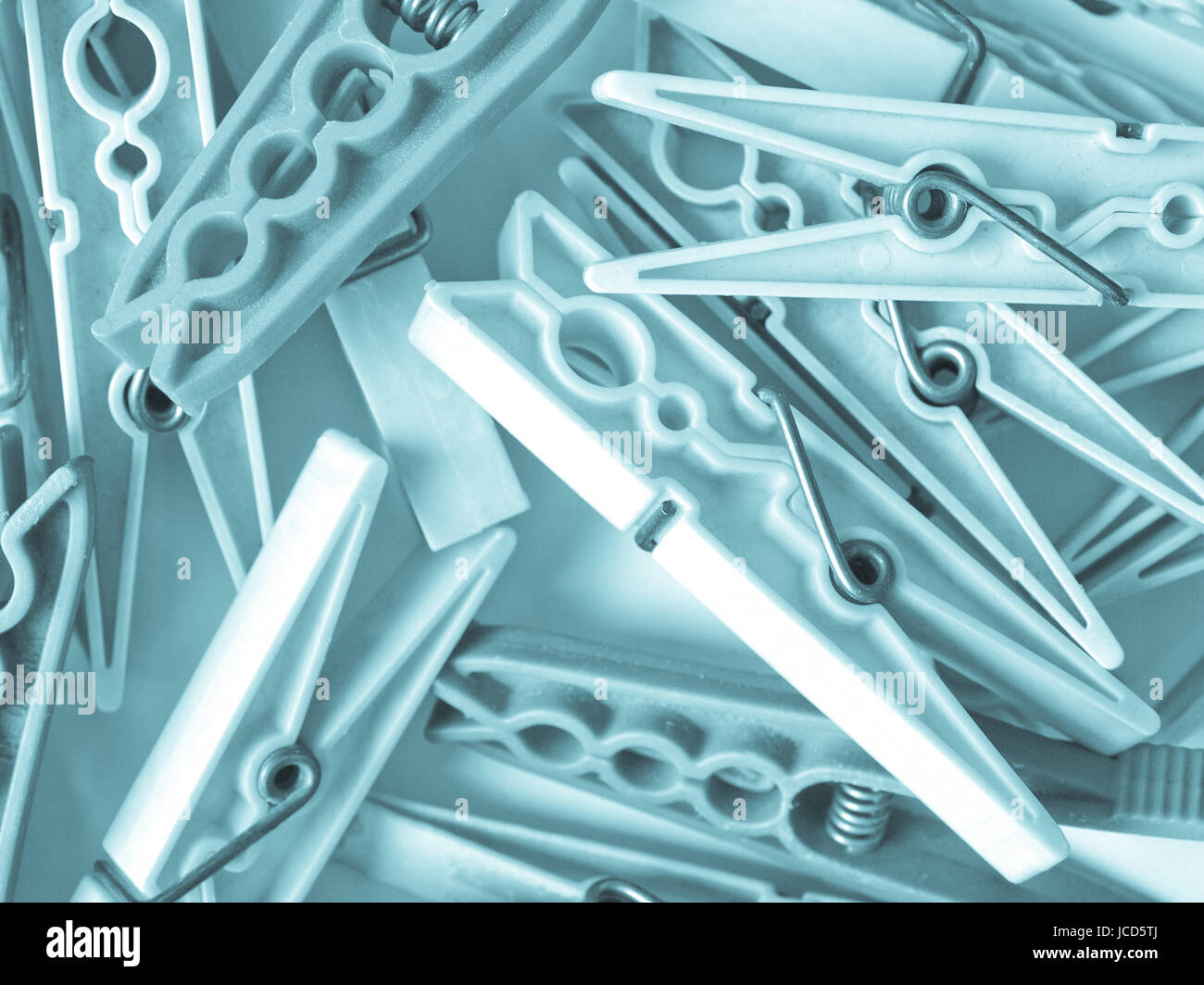 Clothes pegs picture - cool cyanotype Stock Photo - Alamy