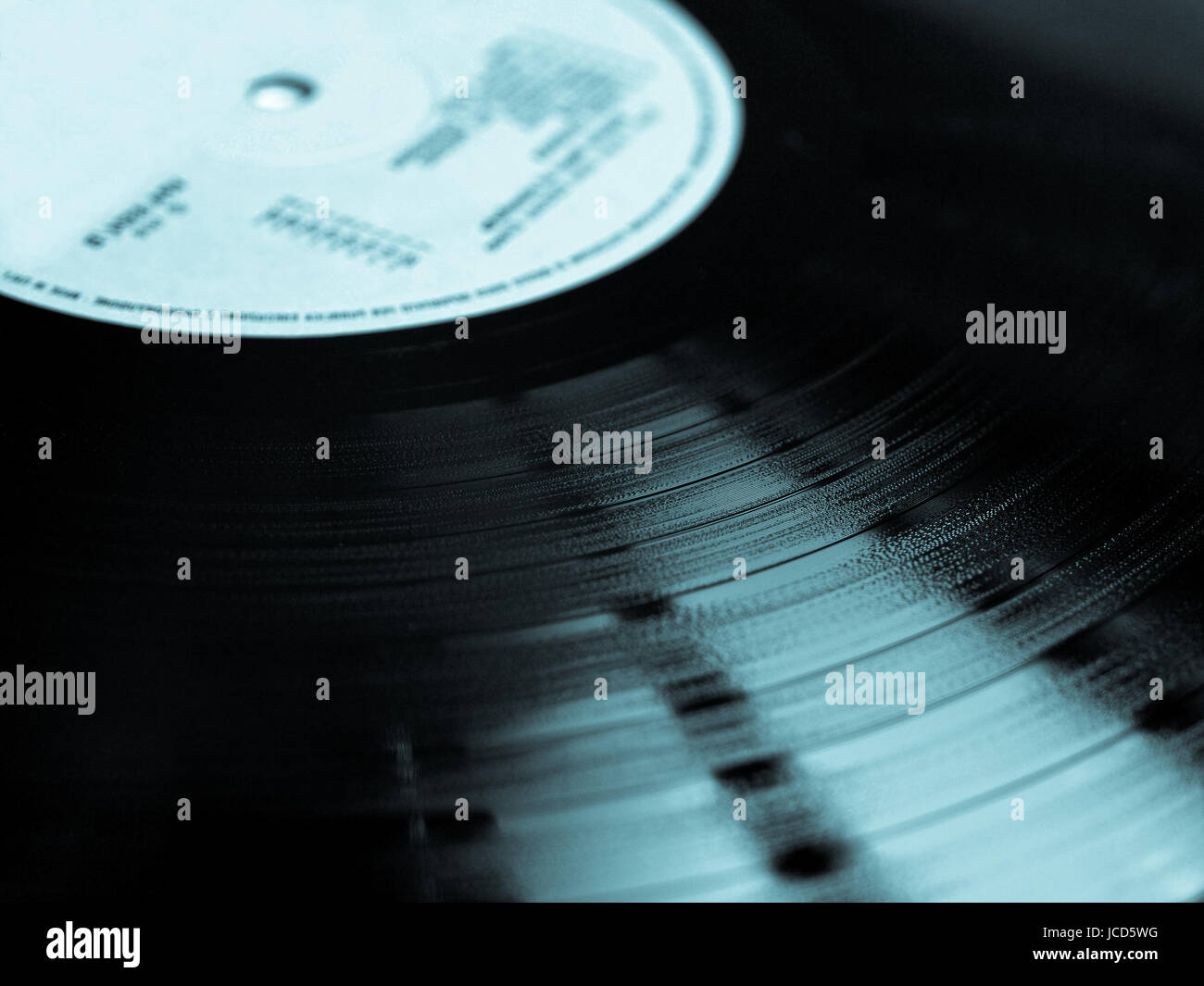 Vinyl record music recording support - cool cyanotype Stock Photo - Alamy