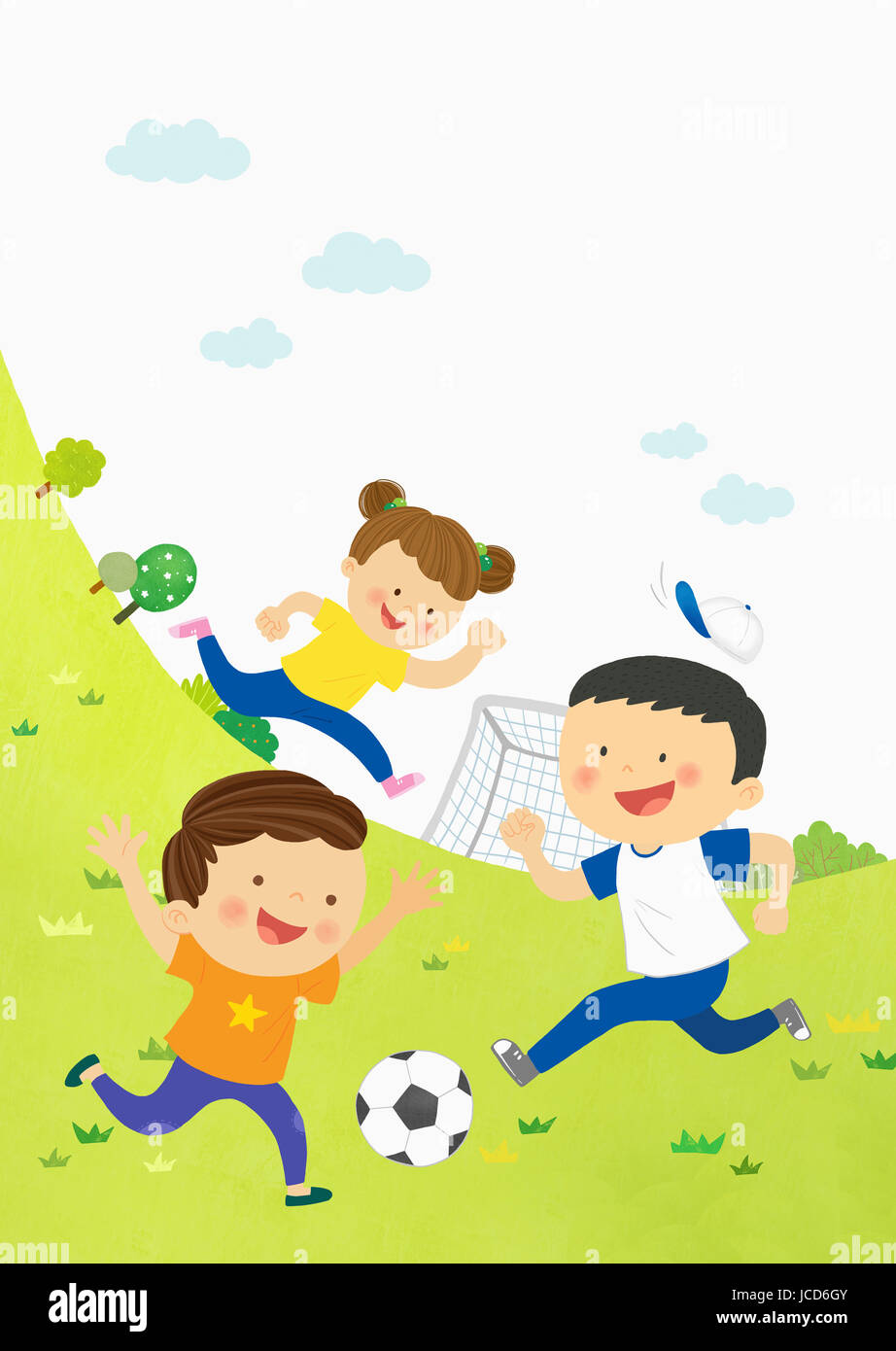 Smiling kids playing soccer Stock Photo - Alamy