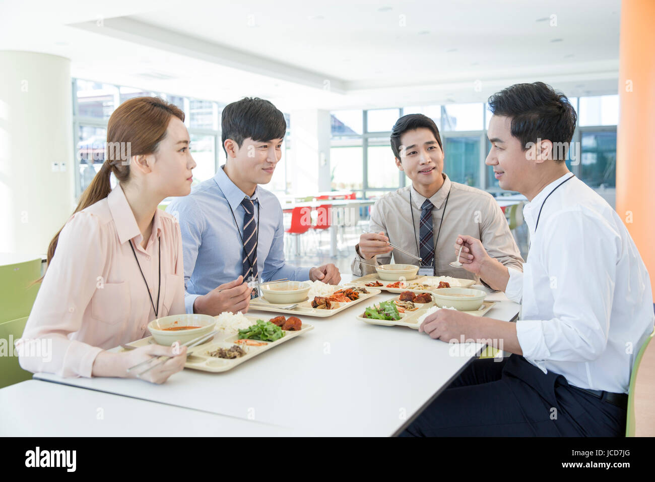 Coworkers having conversation hi-res stock photography and images - Alamy