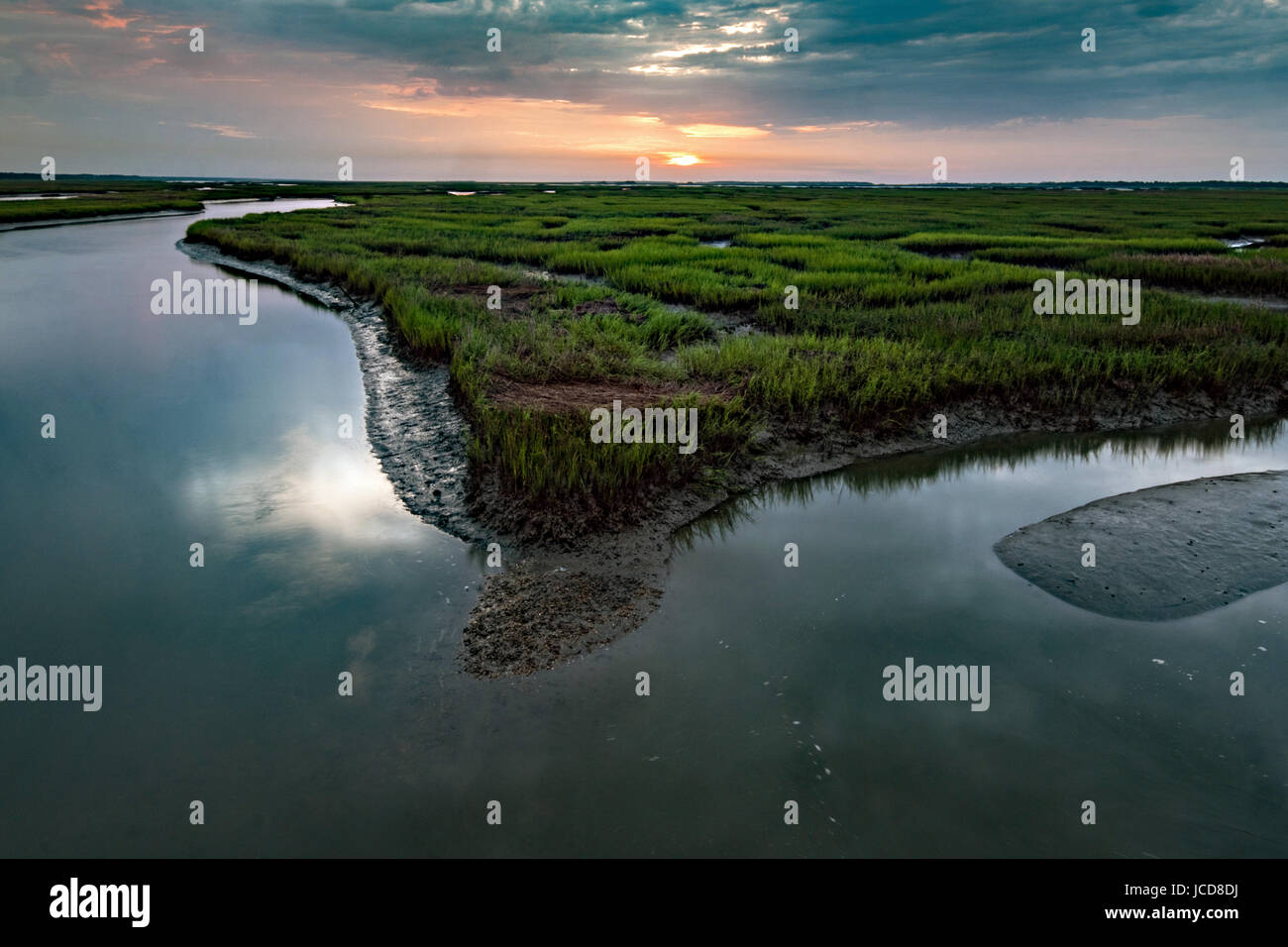 Sunrise over the tidal salt marshes of the Cape Romain National ...