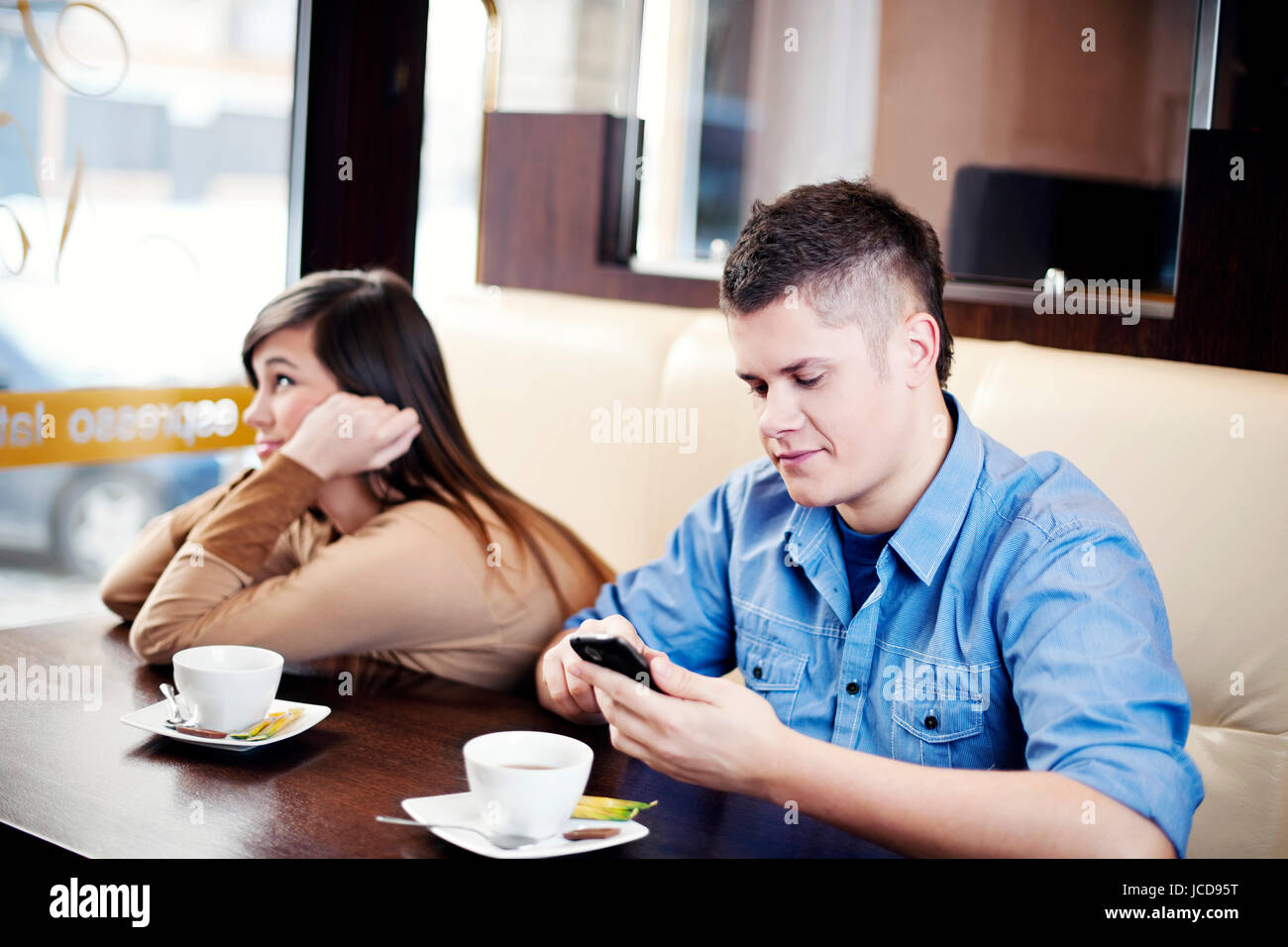 Restaurant cafe phone ignoring hi-res stock photography and images - Alamy
