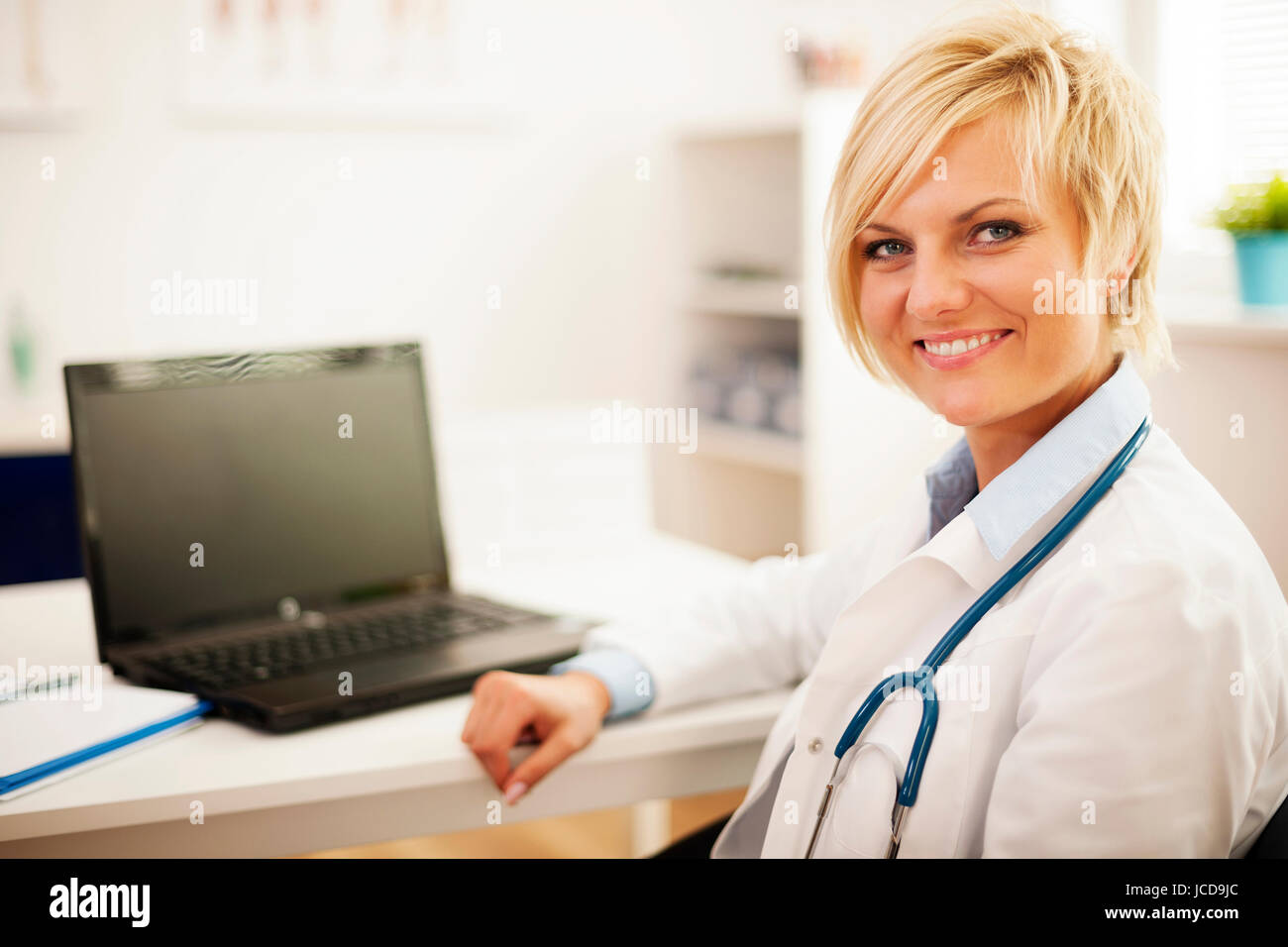 Stethoscope around female doctors hi-res stock photography and images ...