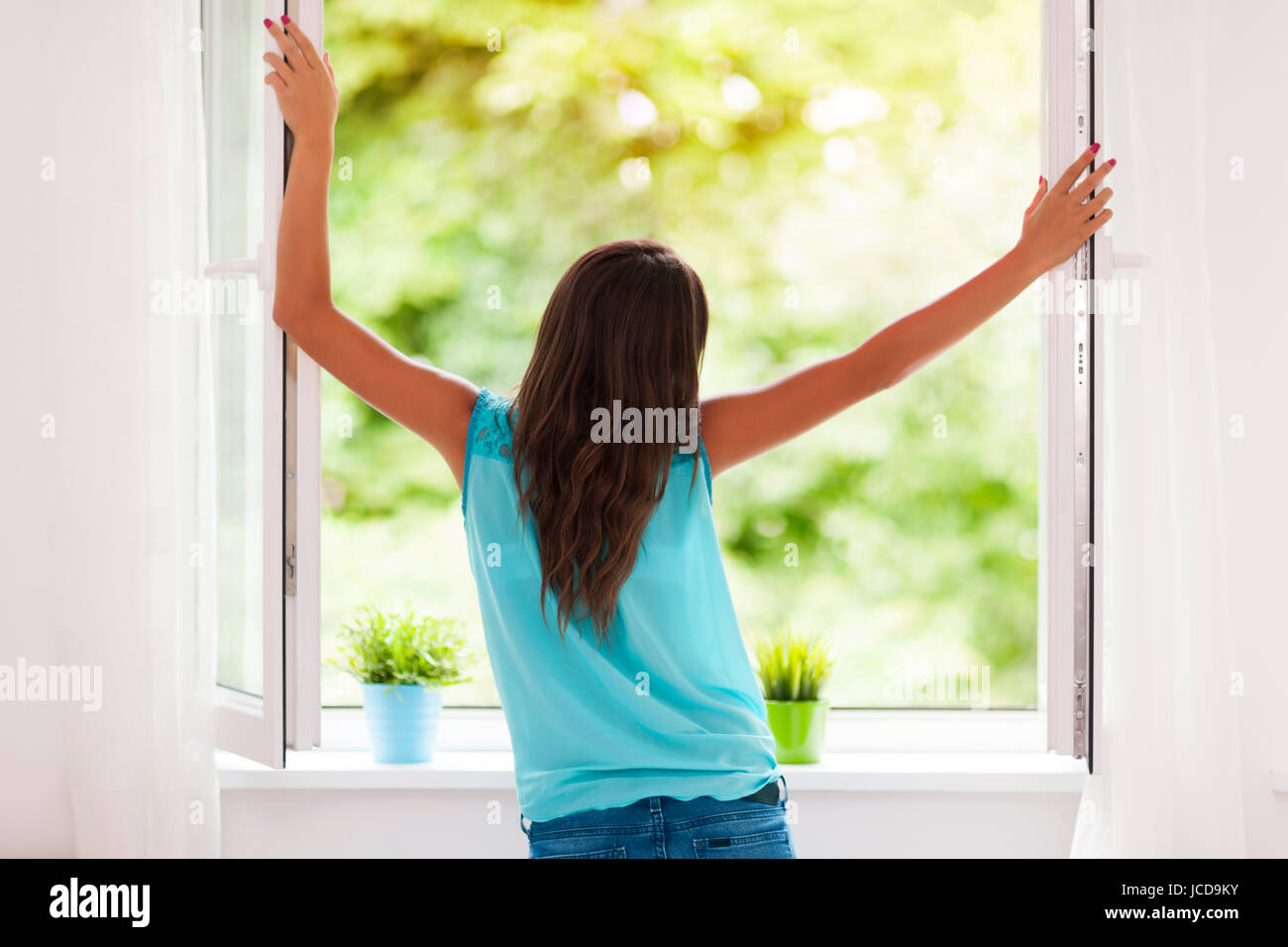 Young woman breathing fresh air during the summer Stock Photo - Alamy