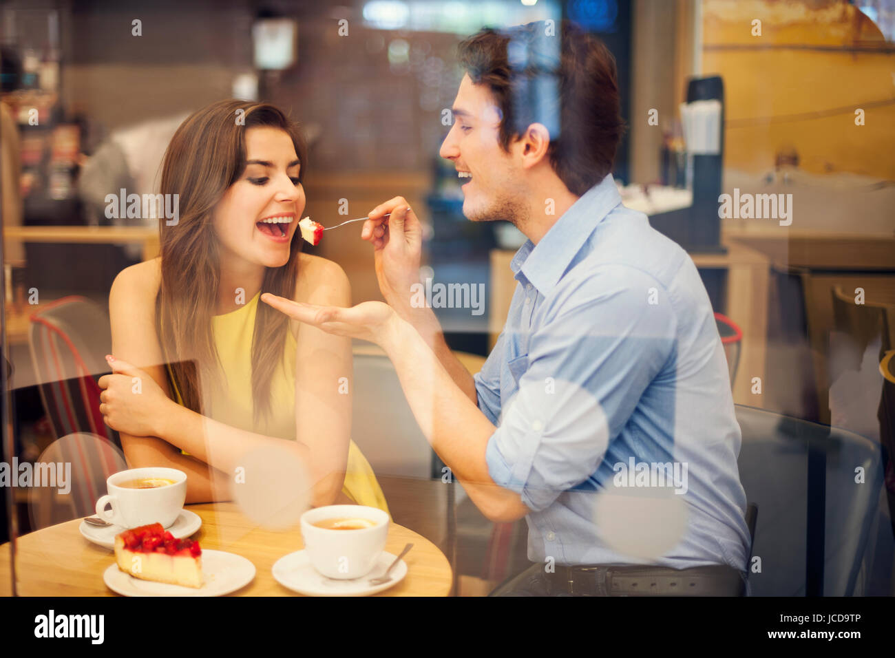 Romantic dating in a cafe Stock Photo - Alamy