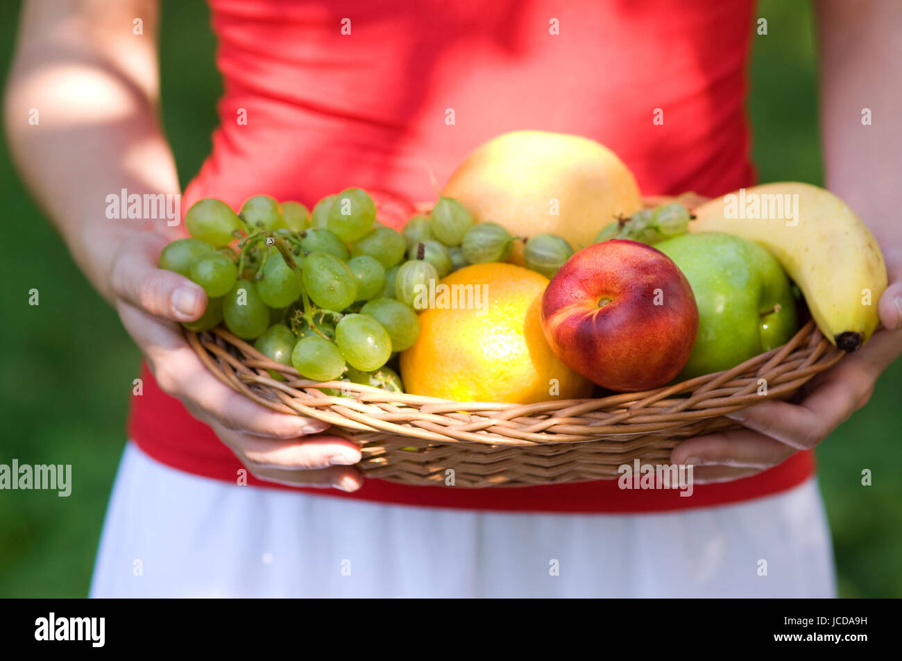 Fresh fruits in basket Stock Photo - Alamy