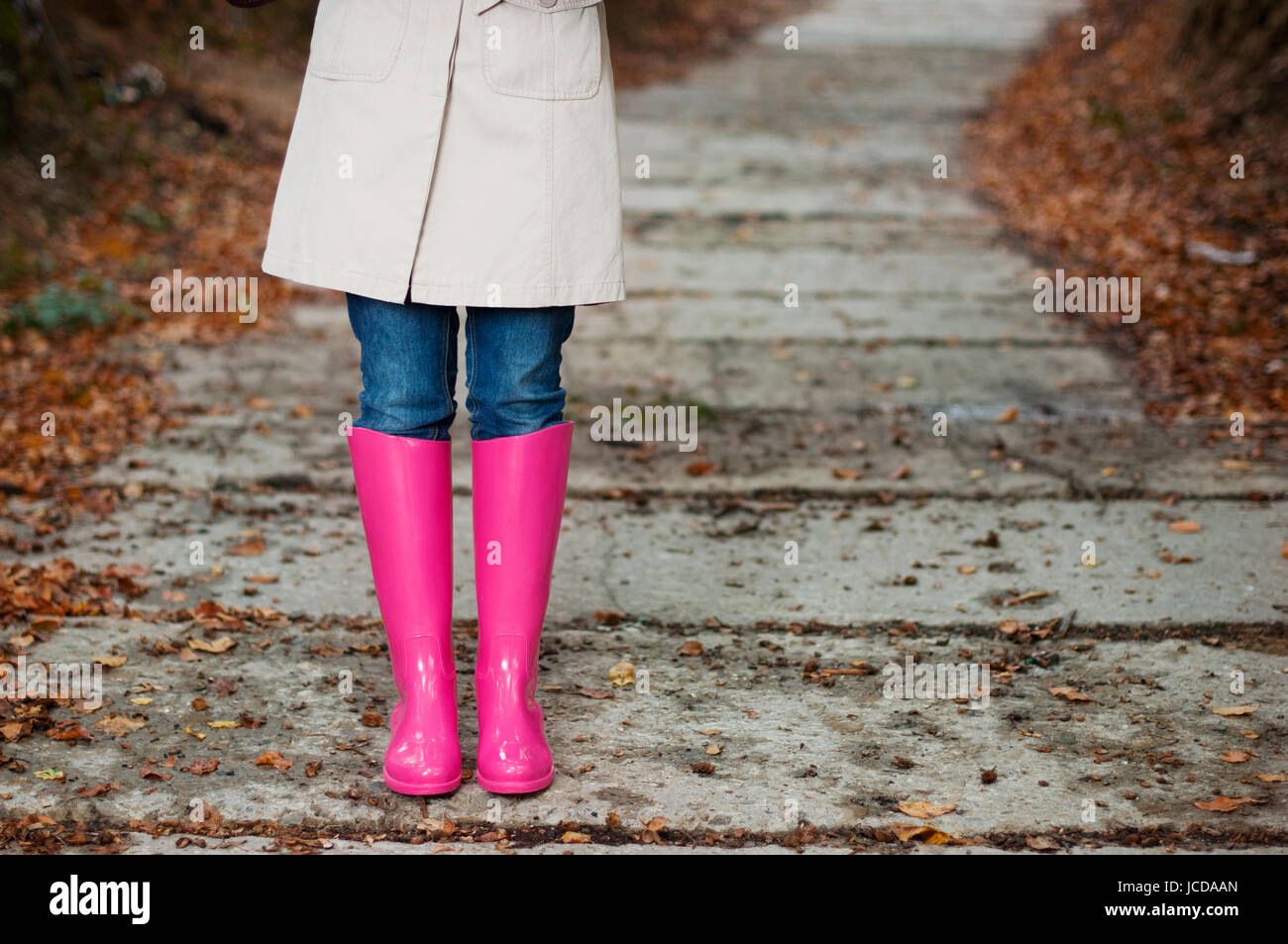 Woman wearing rubber boots Stock Photo - Alamy