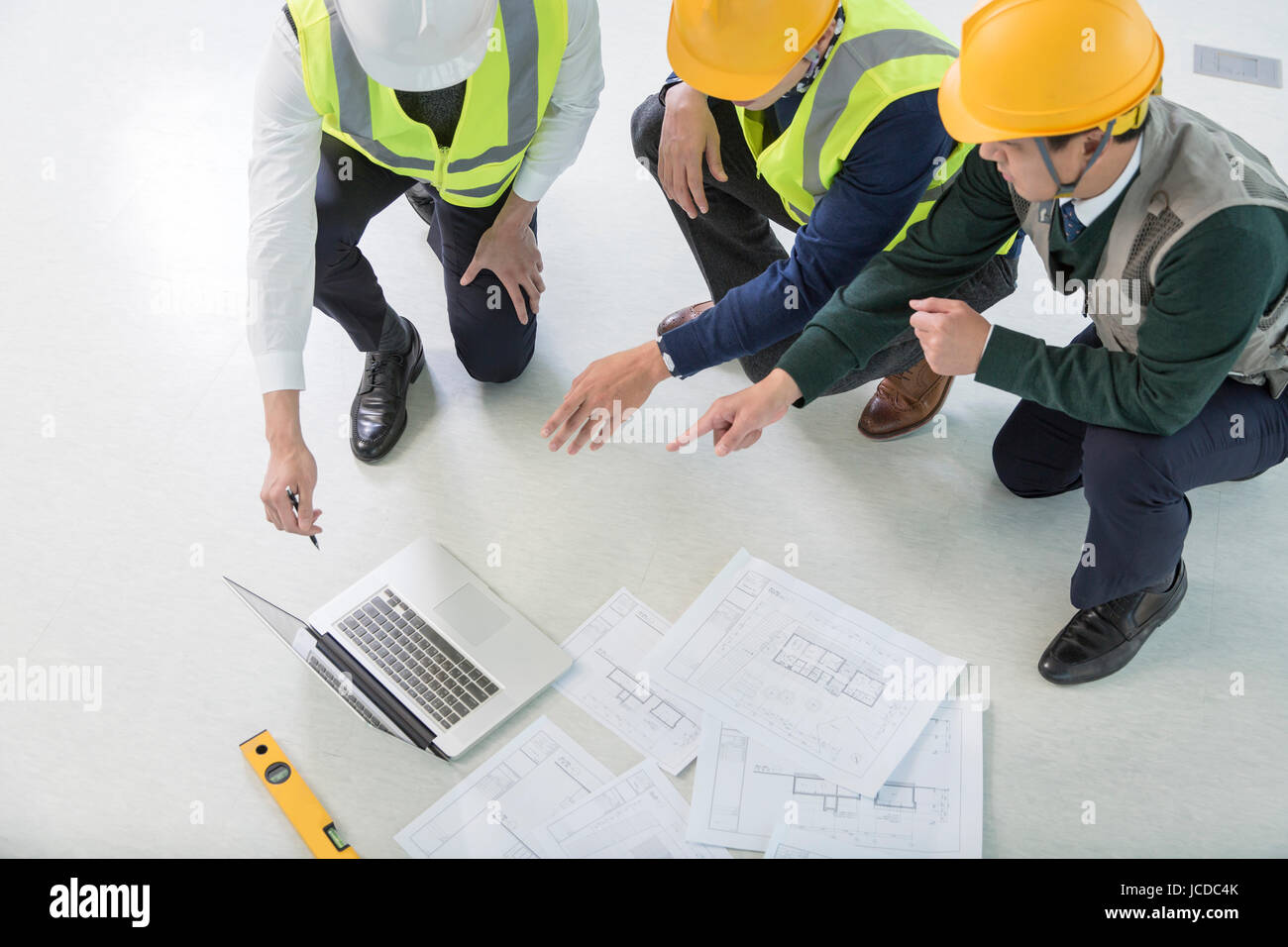 Three architects having a meeting Stock Photo - Alamy