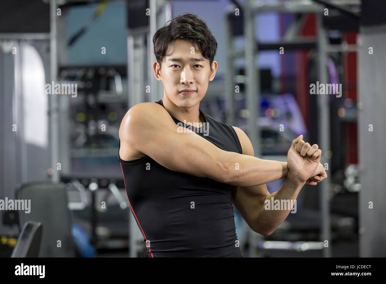 Stretching arms portrait man hi-res stock photography and images - Alamy
